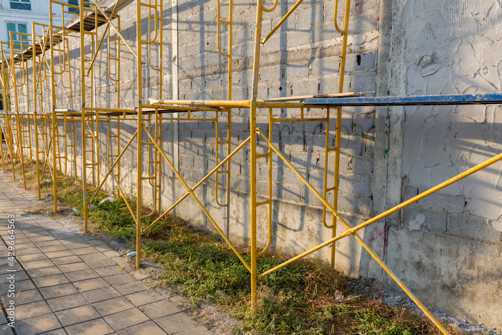 Extensive scaffolding providing platforms for work in progress on a new ...