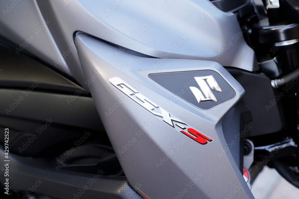 suzuki GSX-s motorcycle with large text logo and brand sign on modern ...