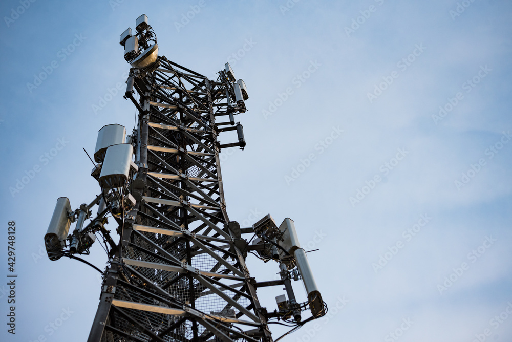 Mobile telephony base station. Metal mast structure with devices ...