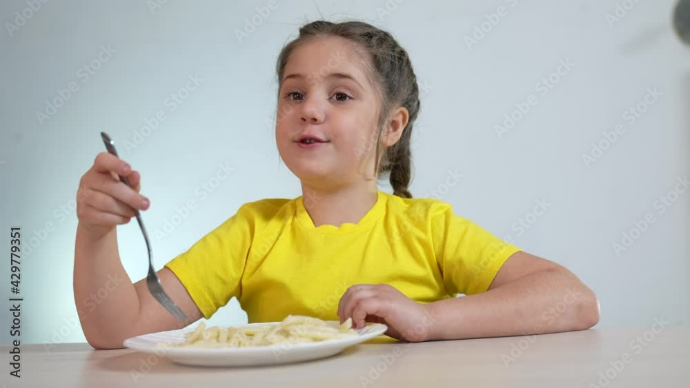 child eating pasta. healthy a food vegetarianism concept. girl child at ...