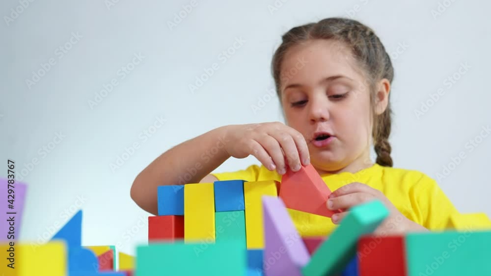 child play with cubes a toys blocks. childhood kindergarten kid happy ...