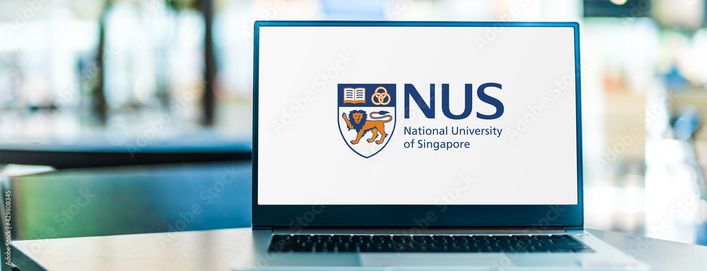 Laptop computer displaying logo of NUS Stock Photo | Adobe Stock