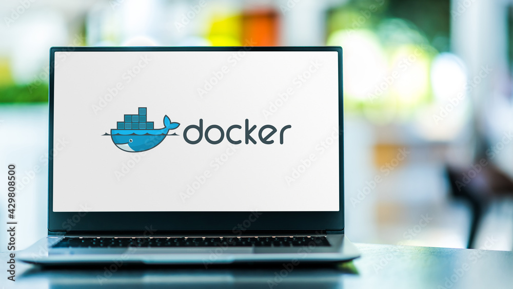 Laptop computer displaying logo of Docker Stock Photo | Adobe Stock