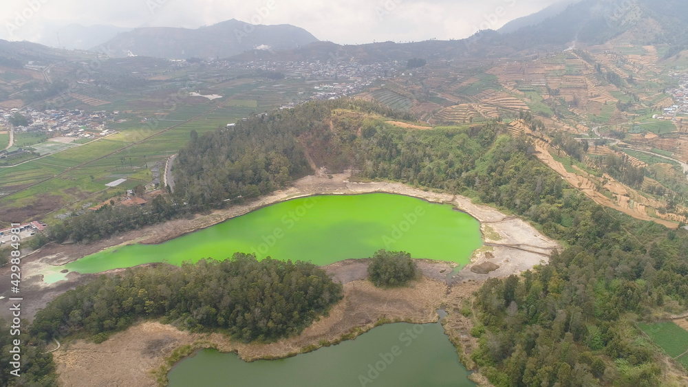 volcanic sulfur lake telaga warna in dieng plateau, java Indonesia ...