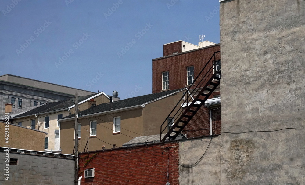 Rooftops of Brick and Masonry Buldings with Black Wrought Iron Fire ...