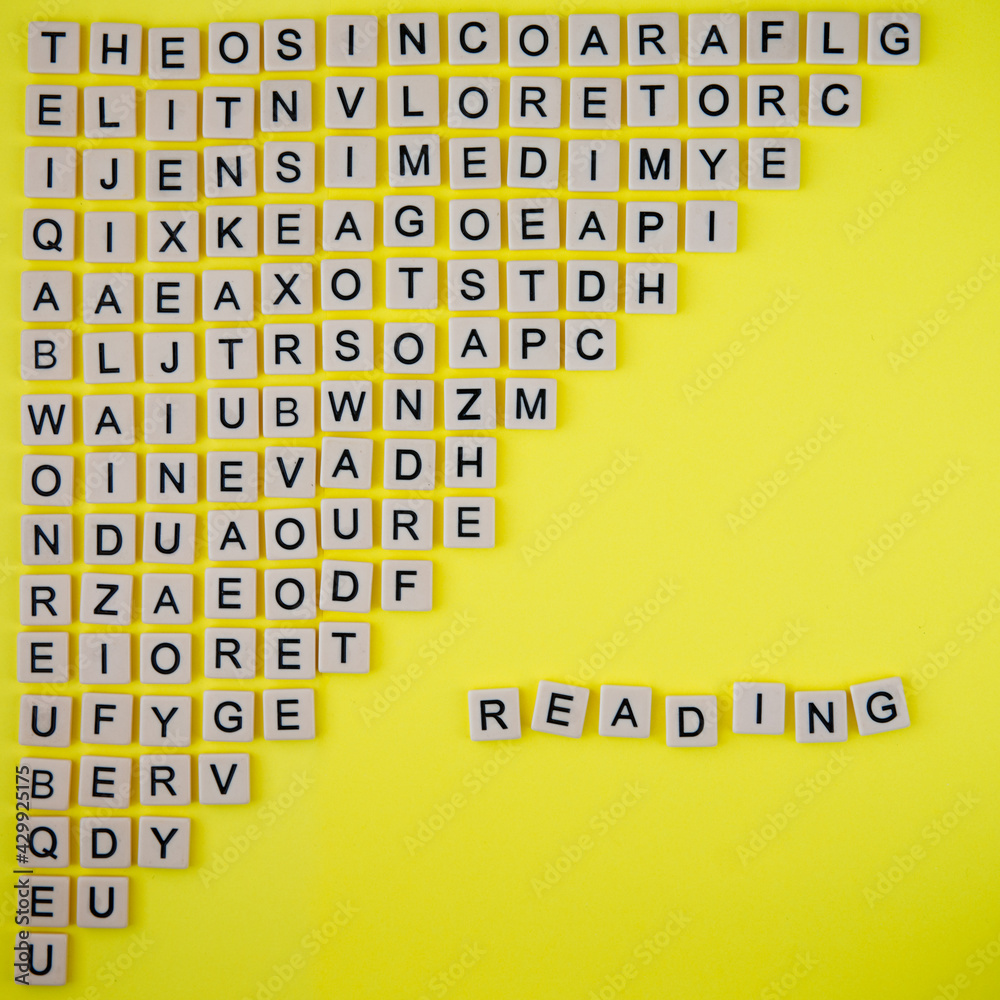 Reading sign of English learning skills written on yellow paper ...