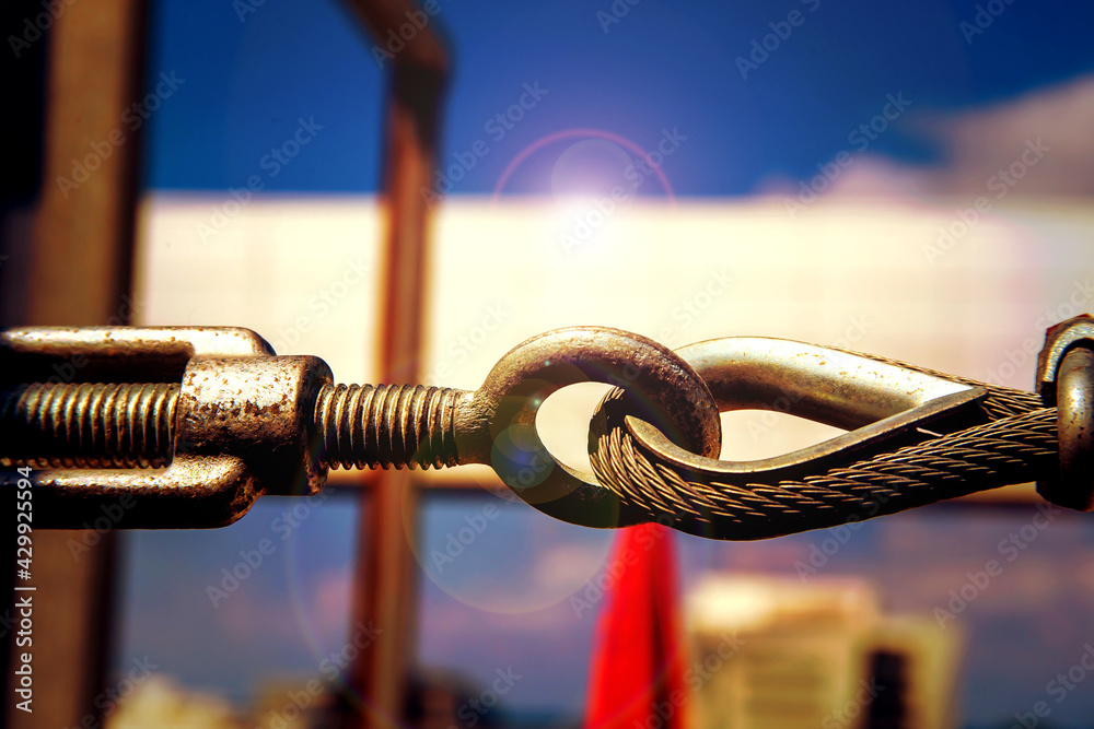 detail of sling and hook, turnbuckle, stretching screw or bottlescrew ...
