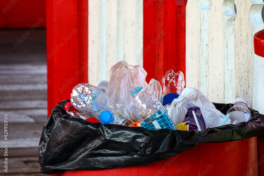 garbage waste plastic on trash, lots of plastic waste on the bin ...
