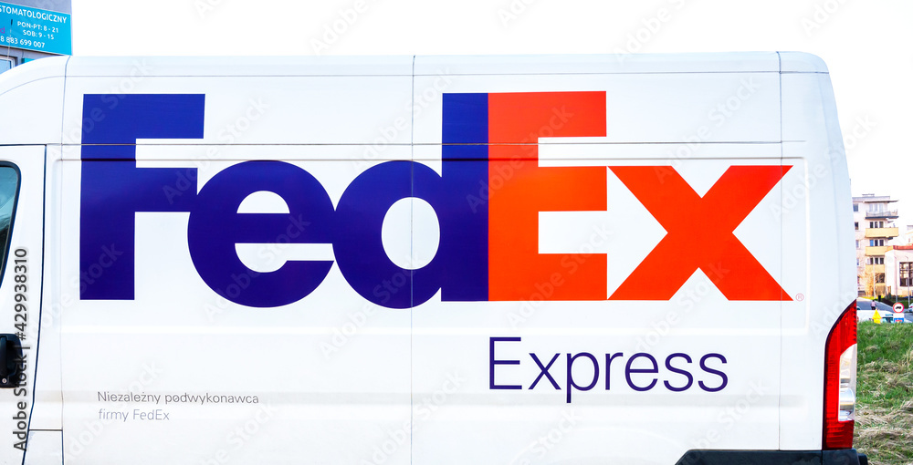 Foto de FedEx Express company logo on a delivery van, side view ...