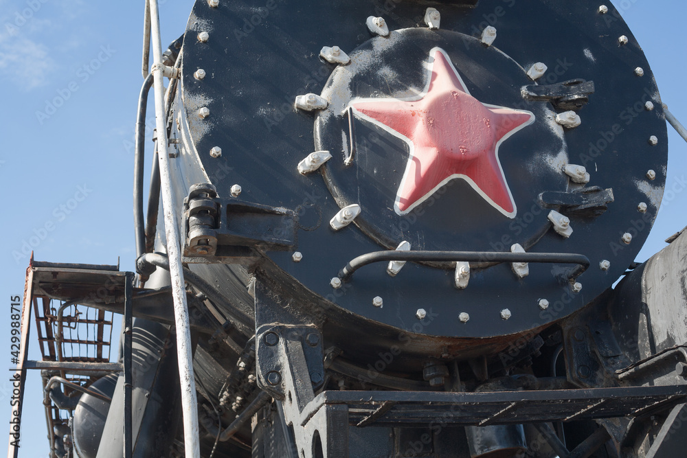 Iron wheels of mighty steam locomotives, red iron wheels of steam ...