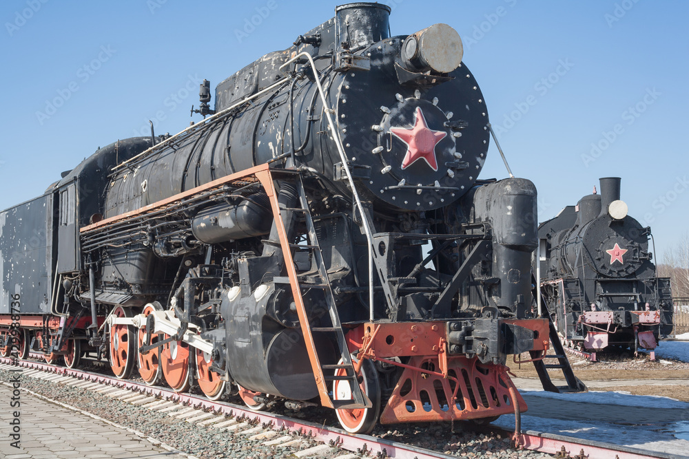 Iron wheels of mighty steam locomotives, red iron wheels of steam ...