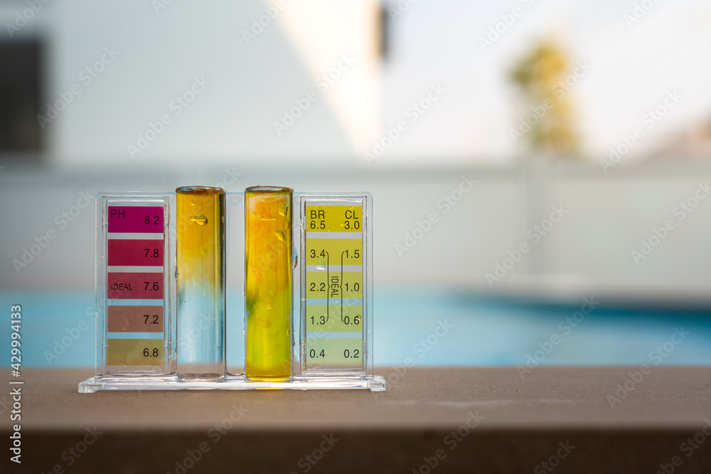 Checking water quality of swimming pool by using chemical test kit to ...