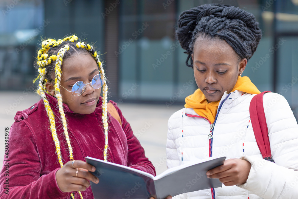 African american black female student help to studing, looking in ...