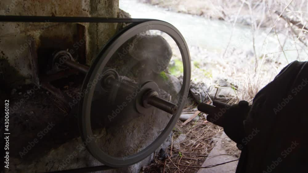 Spinning Wheel from Hydroelectric Turbine Generating Electricity from ...