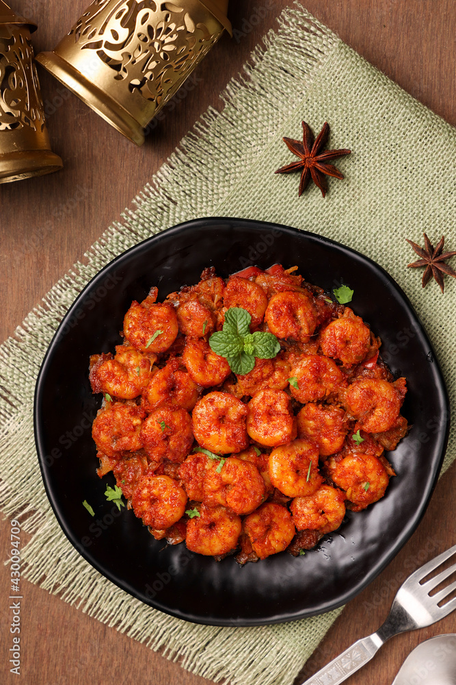 Top view spicy hot Bengali Prawn roast , shrimp masala fish curry ...