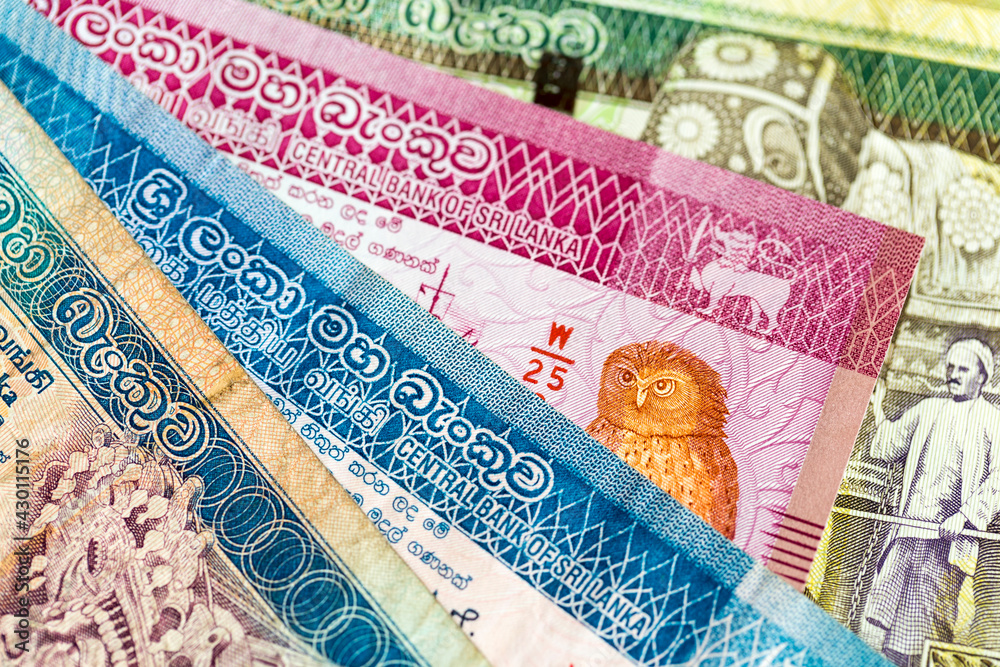 Horizontal detail closeup top view of stack of Sri Lankan Rupees LKR ...
