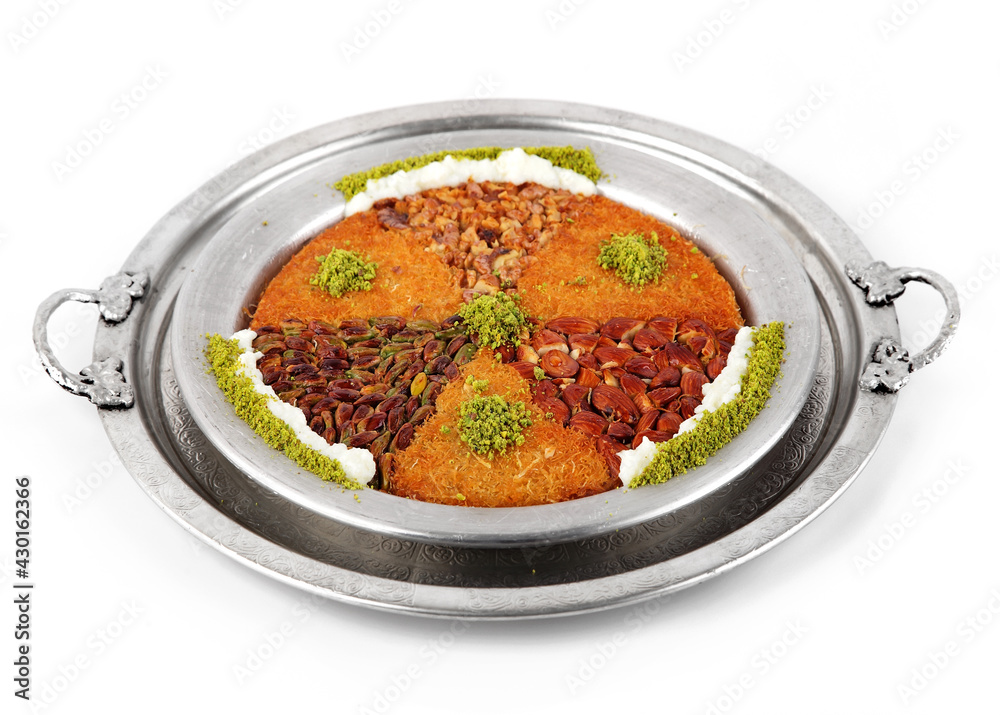Turkish dessert kunefe, kunafa, kadayif with pistachio powder and ...