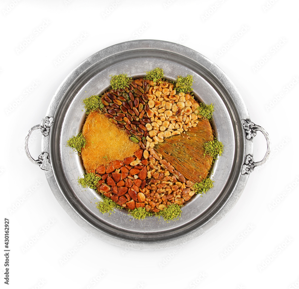 Turkish dessert kunefe, kunafa, kadayif with pistachio powder and ...