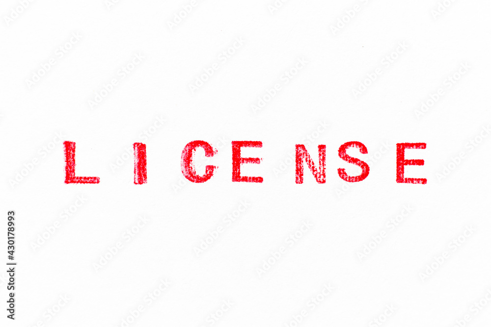 Red color rubber stamp in word license on white paper background Stock ...