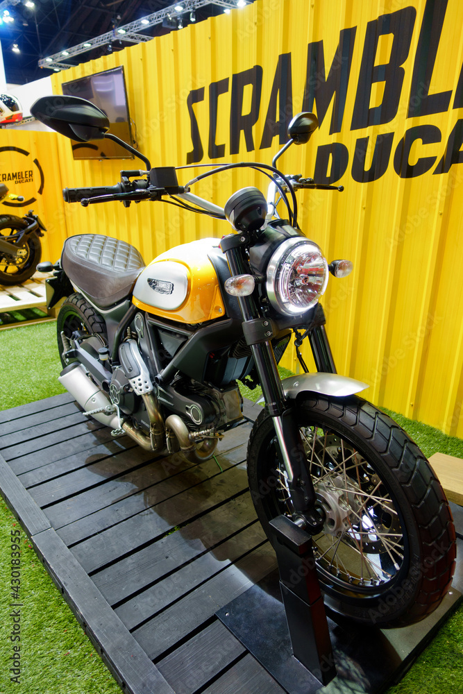 Close up elegant design Scrambler Ducati l motorcycle display in the ...