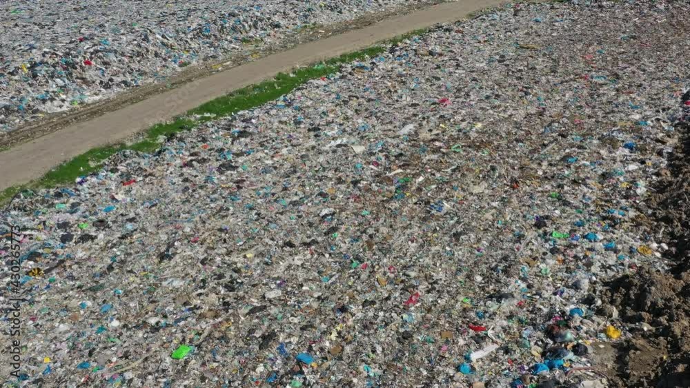 Aerial top view of open storage of solid household waste. Violation of ...