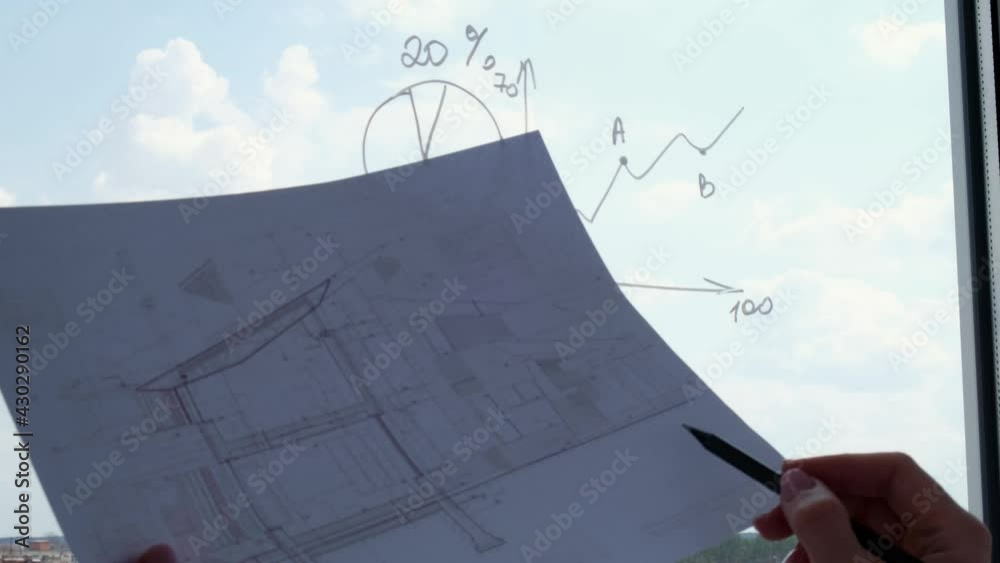 4k Female interior designer drawing house plan in office. Workplace ...