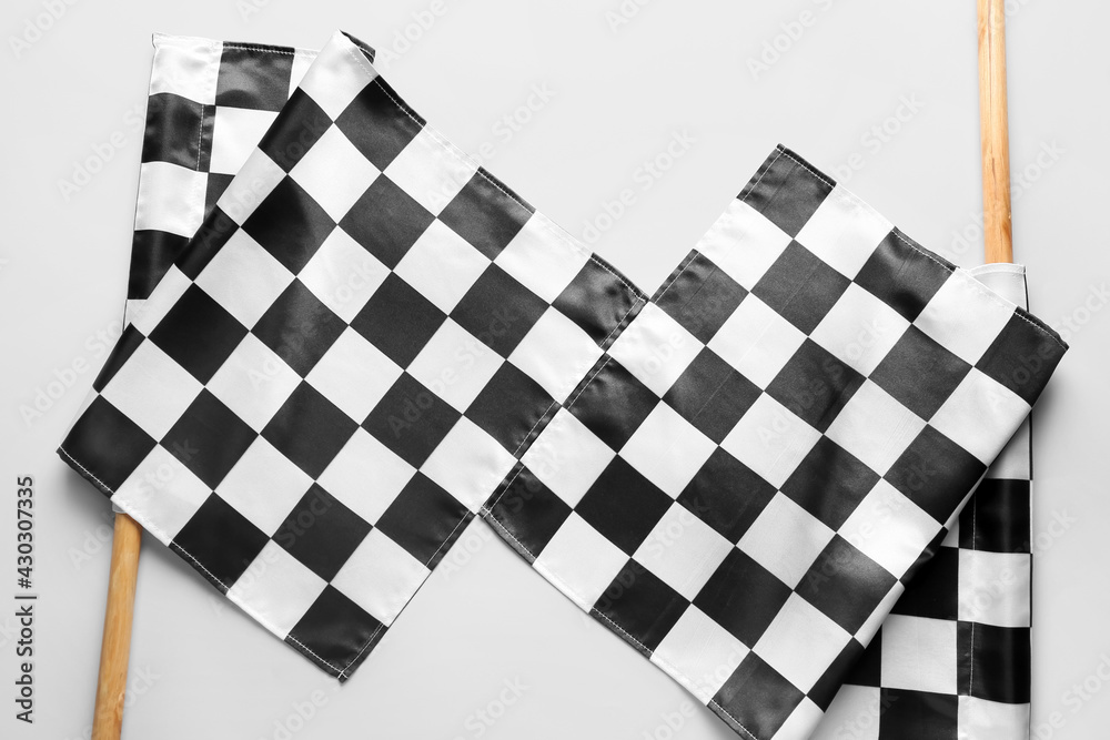 Racing flags on light background Stock Photo | Adobe Stock