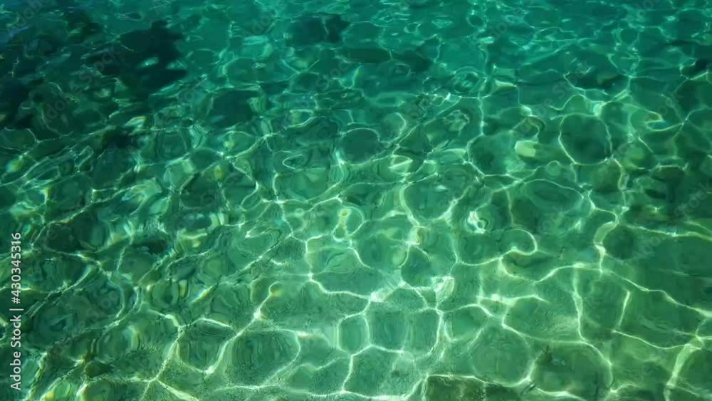 Video Stock Sea water as a backdrop. Transparent sea in the summertime ...