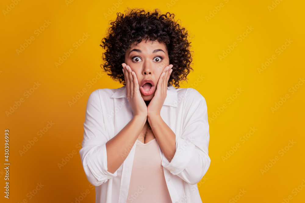 Speechless crazy young woman face in excitement hands cheeks open mouth ...