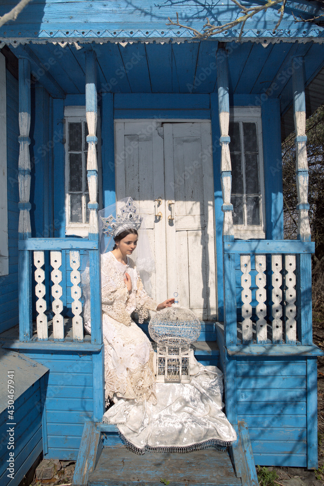 Princess Swan. Bride girl in kokoshnik, white dress. Porch door. Rural ...