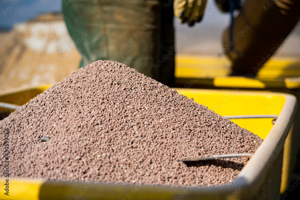 loading of mineral fertilizer into the hopper of the sowing unit Stock ...