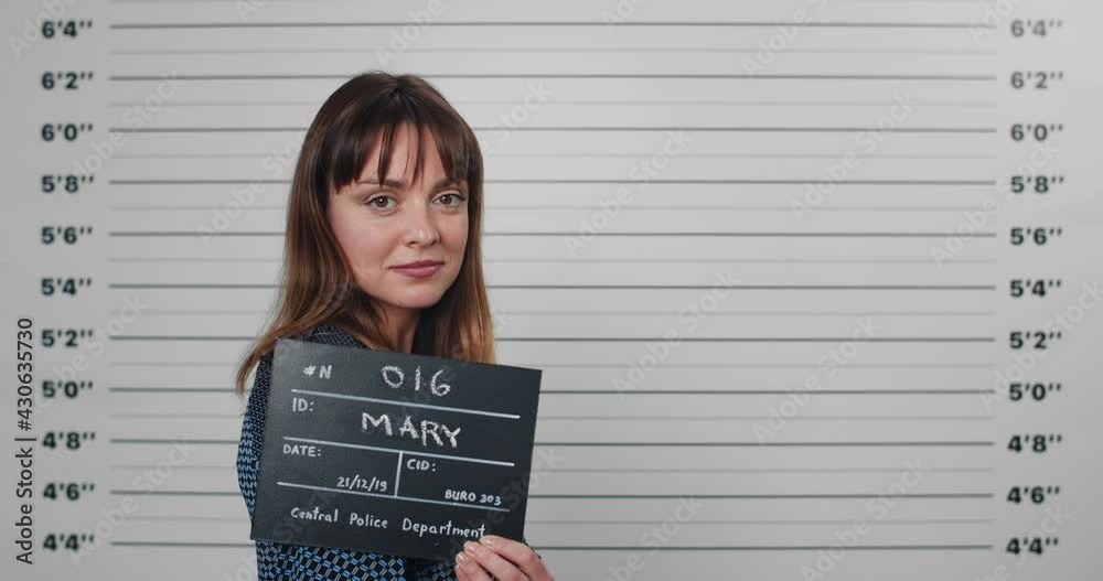 Video „Mugshot of arrested female person in 40s turning head and ...