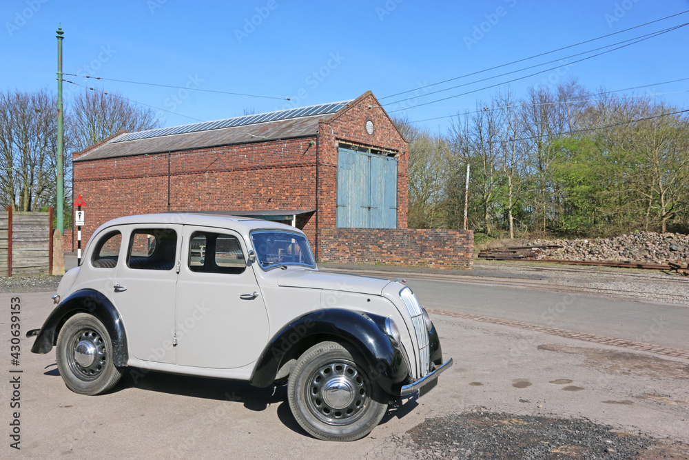 Vintage white car on the road Stock Photo | Adobe Stock