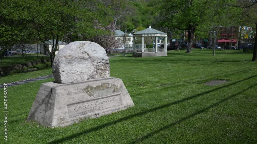 Historic James Rumsey millstone with gazebo in the distance in Berkeley ...
