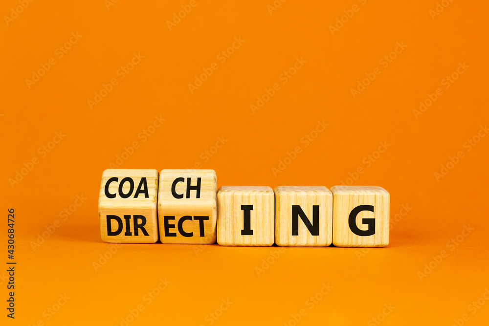 Coaching or directing leadership style symbol. Turned cubes and changed ...