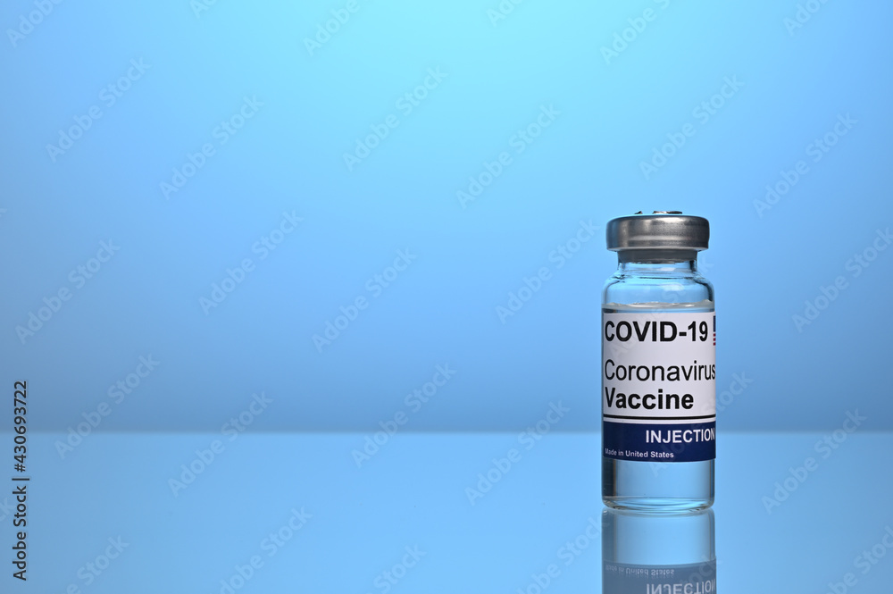 Covid vaccine vial with copyspace on blue gradient background. Covid-19 ...