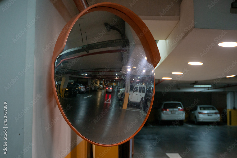 Curve mirror at a basement parking.Traffic mirror safety and security ...