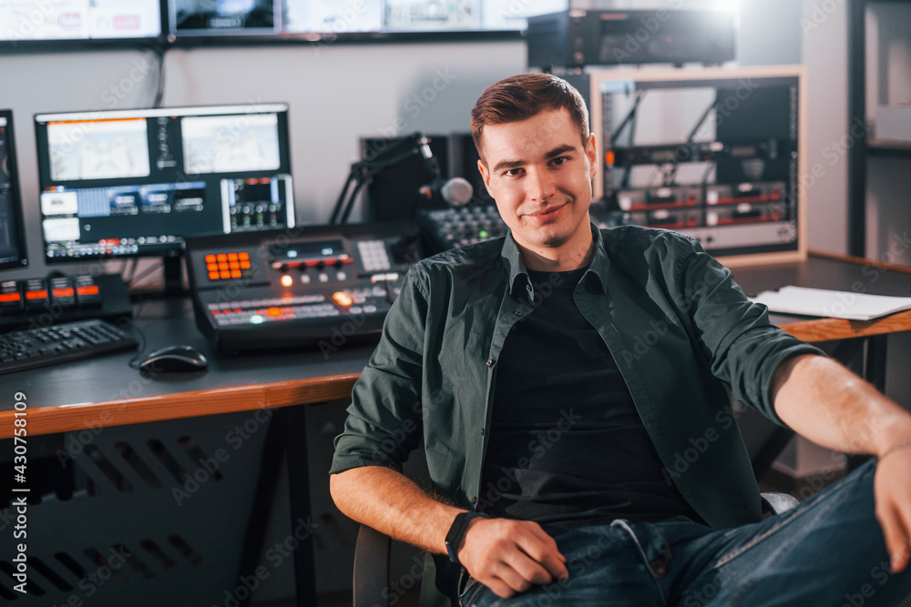 Young man is indoors in the radio studio is busy by broadcast Stock ...