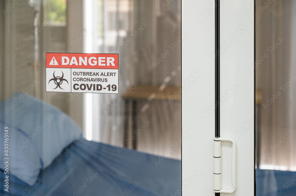 Sign in front of patient bed room door at quarantine zone area in ...