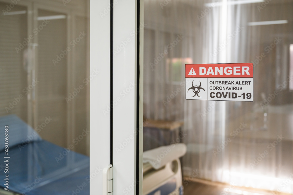 Sign in front of patient bed room door at quarantine zone area in ...