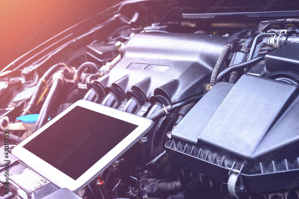 Automobile mechanic repairman hands repairing a car engine automotive ...