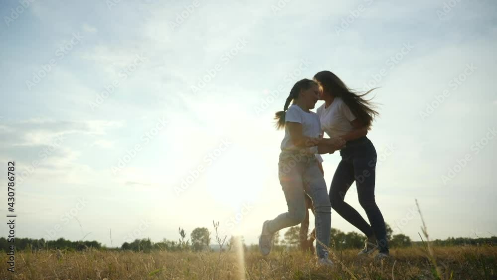happy family kid together run catch-up in the park at silhouette ...