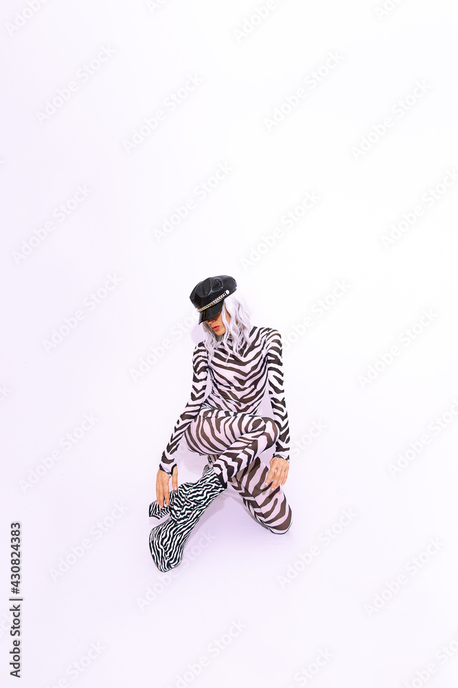 Sexy androgenic blonde model in freak stylish zebra print look and ...