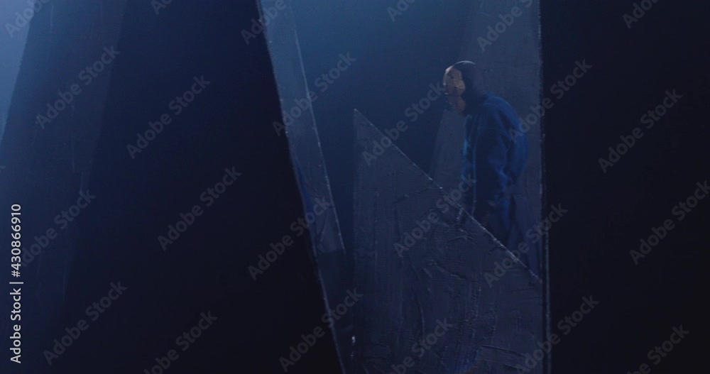 Mystic footage of metal masked man . Epic scene of people with triangle ...