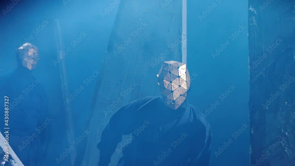 Mystic footage of metal masked man . Epic scene of people with triangle ...