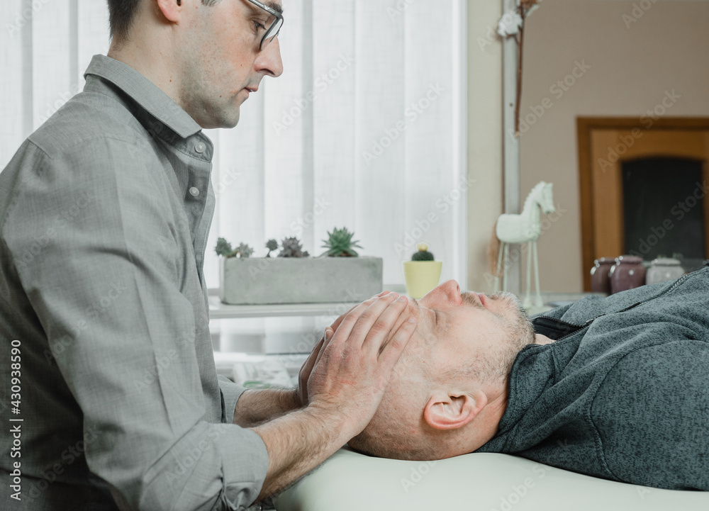 CST practitioner relieves compression in the bones of the head, sacrum ...