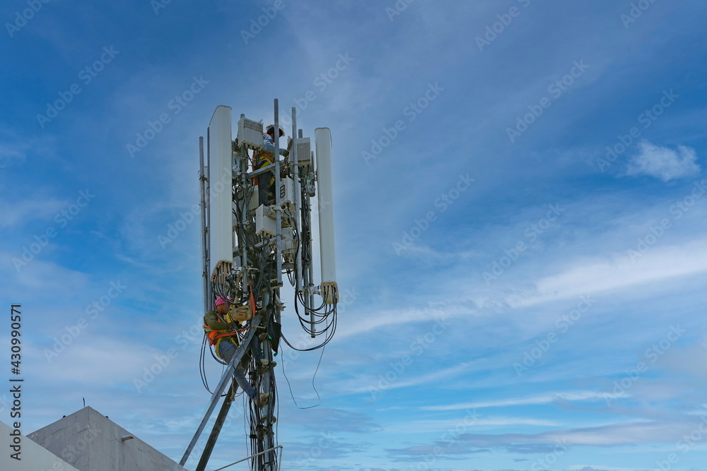 Engineer maintenance on telecommunication tower doing ordinary ...