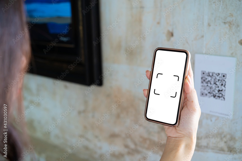 Scanning QR code with mobile smart phone. Isolated on white background ...