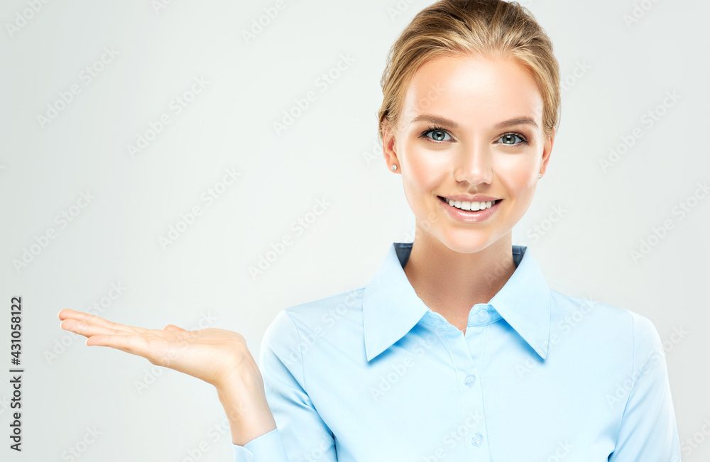 Woman Surprise Showing Product Beautiful Smiling Girl In A Blue Shirt