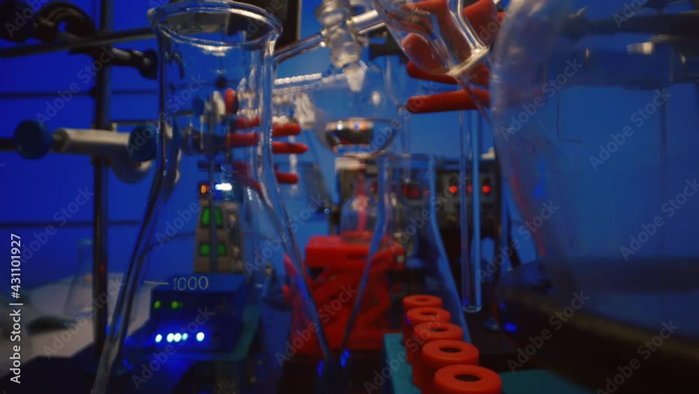 Chemical laboratory with flasks and test tubes. Chemical process with ...